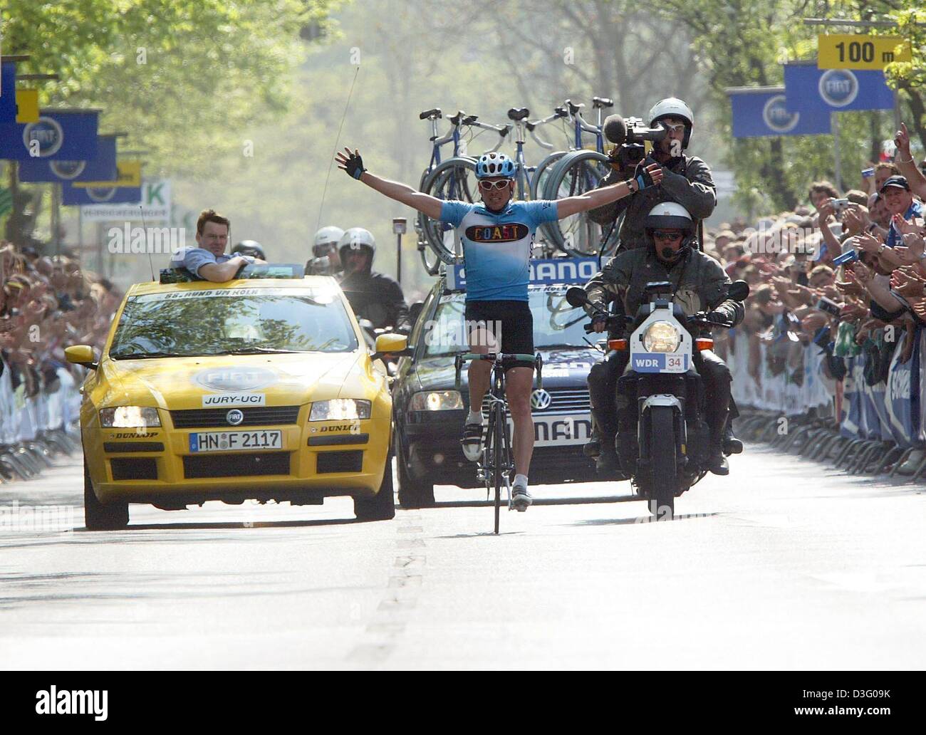 (dpa) - German cyclist Jan Ullrich of Team Coast happily wins the Tour ...