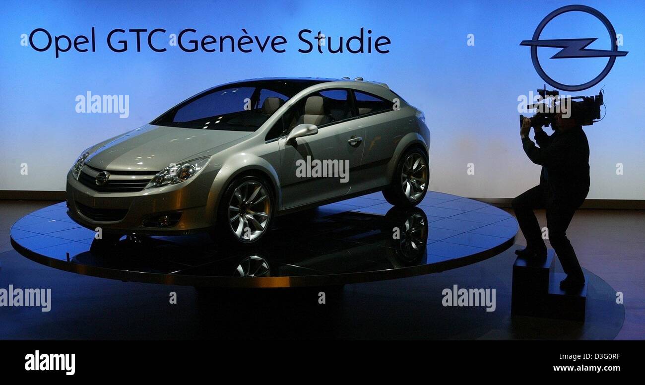 (dpa) - A cameraman films the latest design model of an Opel 'GTC ...