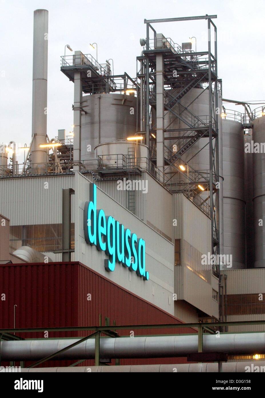 (dpa) - A view of the logo and some factory buildings of the Degussa ...