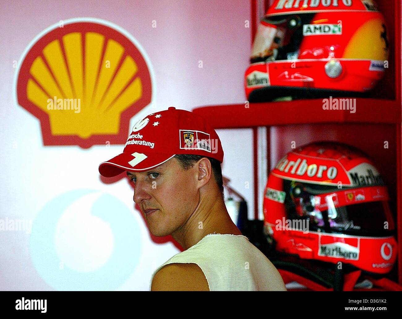 (dpa) - German formula one champion Michael Schumacher (Ferrari) looks ...