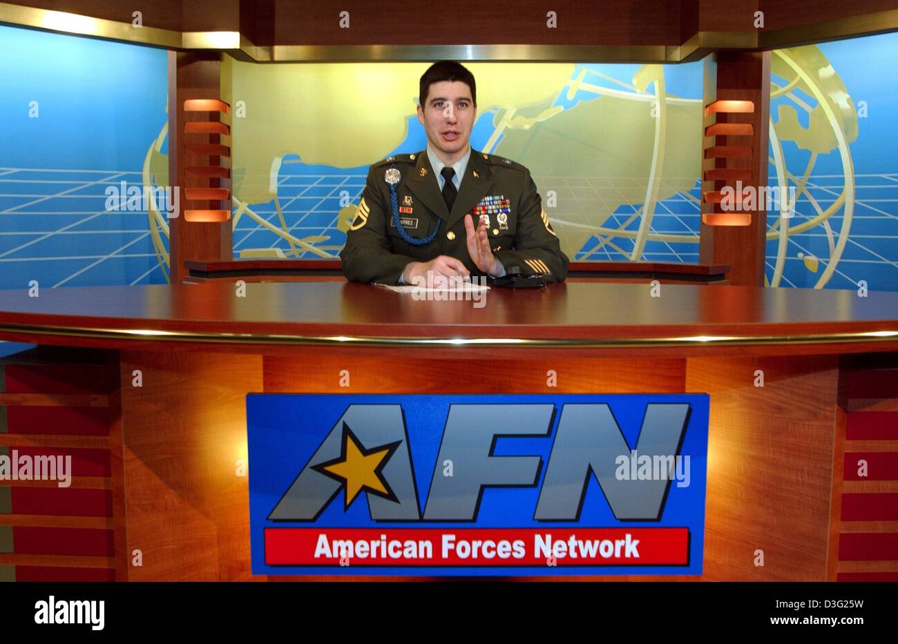 (dpa) - Anchorman Staff Sergeant Hank Minitrez of the American Forces ...