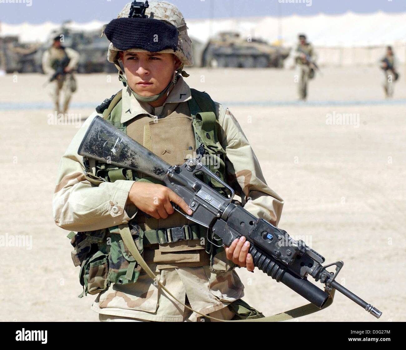 (dpa) - A US marine of the 3rd Infantry Battalion holds an assault ...