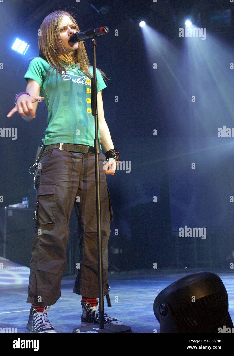 (dpa) - Canadian musician Avril Lavigne performs with her band during ...