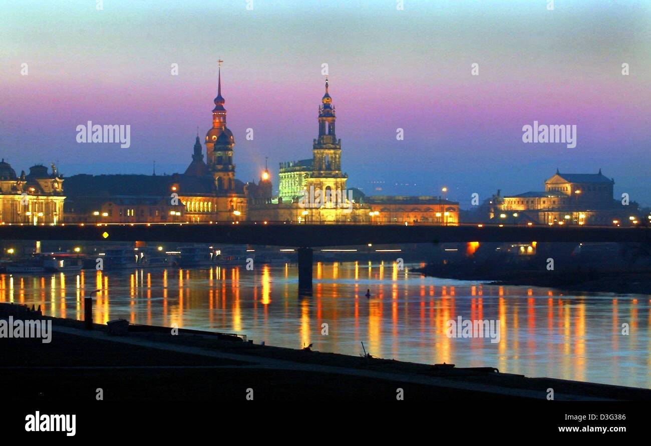 (dpa) - Downtown Dresden lights up as dusk descends on a calm evening ...