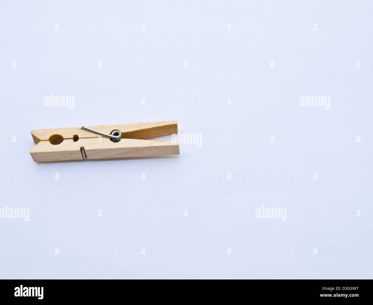 Wooden clothes clips isolated on white background Stock Photo - Alamy