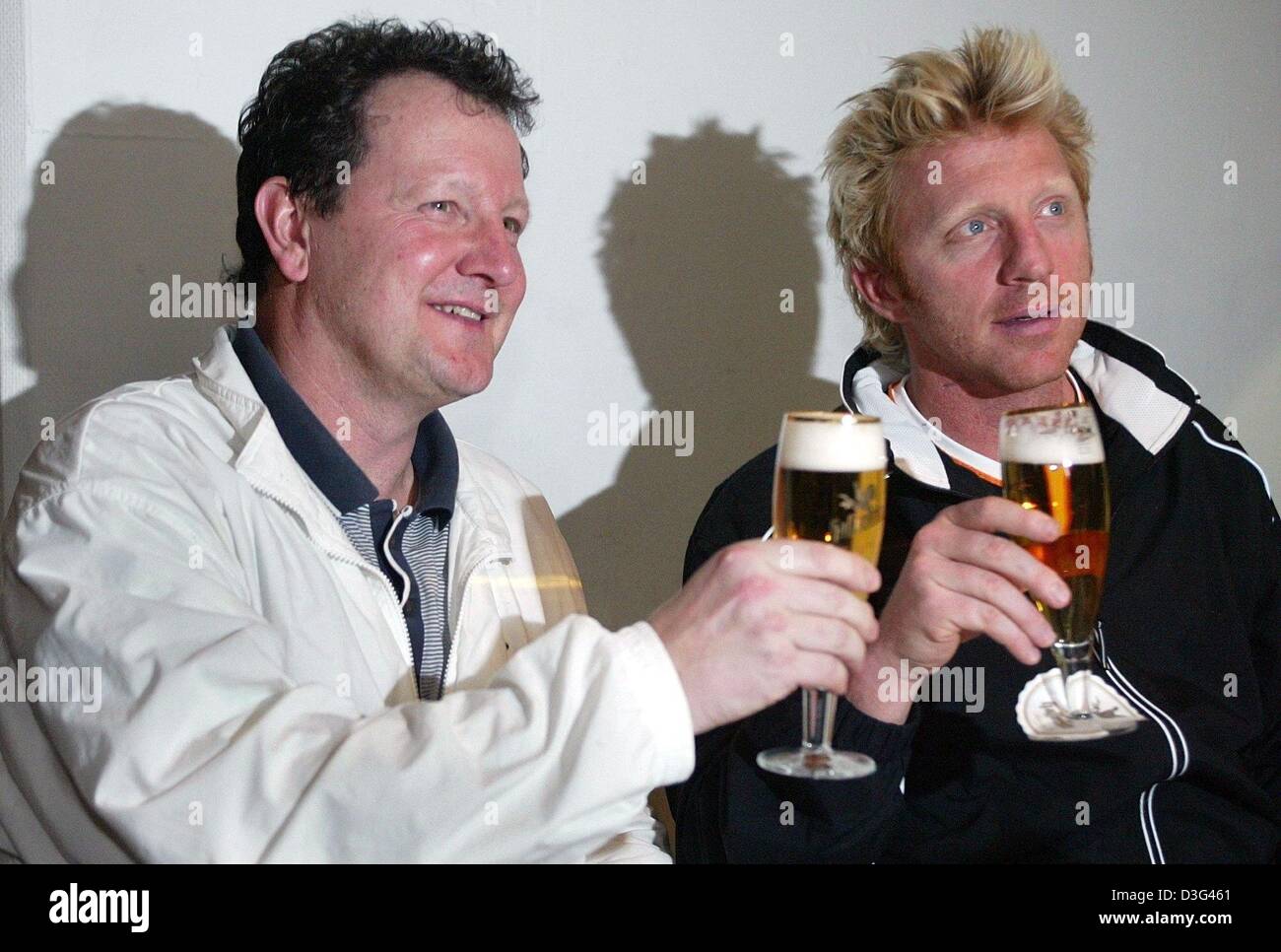 (dpa) - The two German tennis legends Boris Becker (R) and Thomas ...