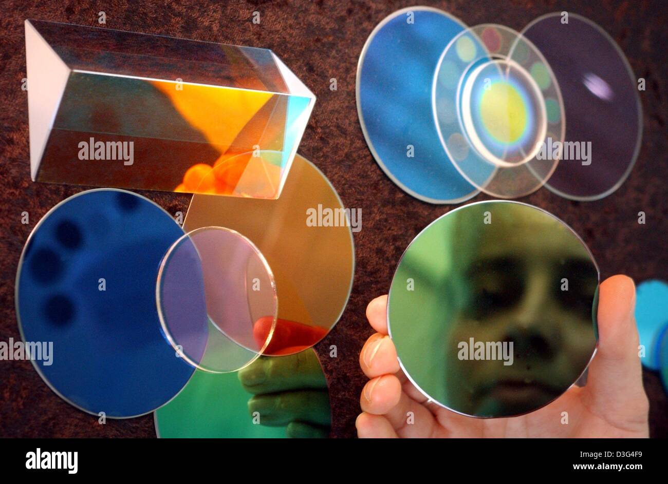 (dpa) - Optical plastic components are covered with an only several ...