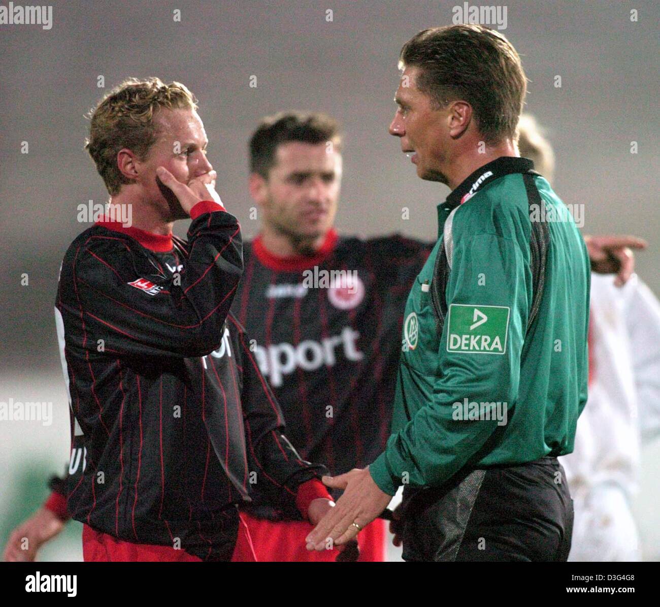 (dpa) - Eintracht's Christoph Preuss holds his mouth shut during a ...