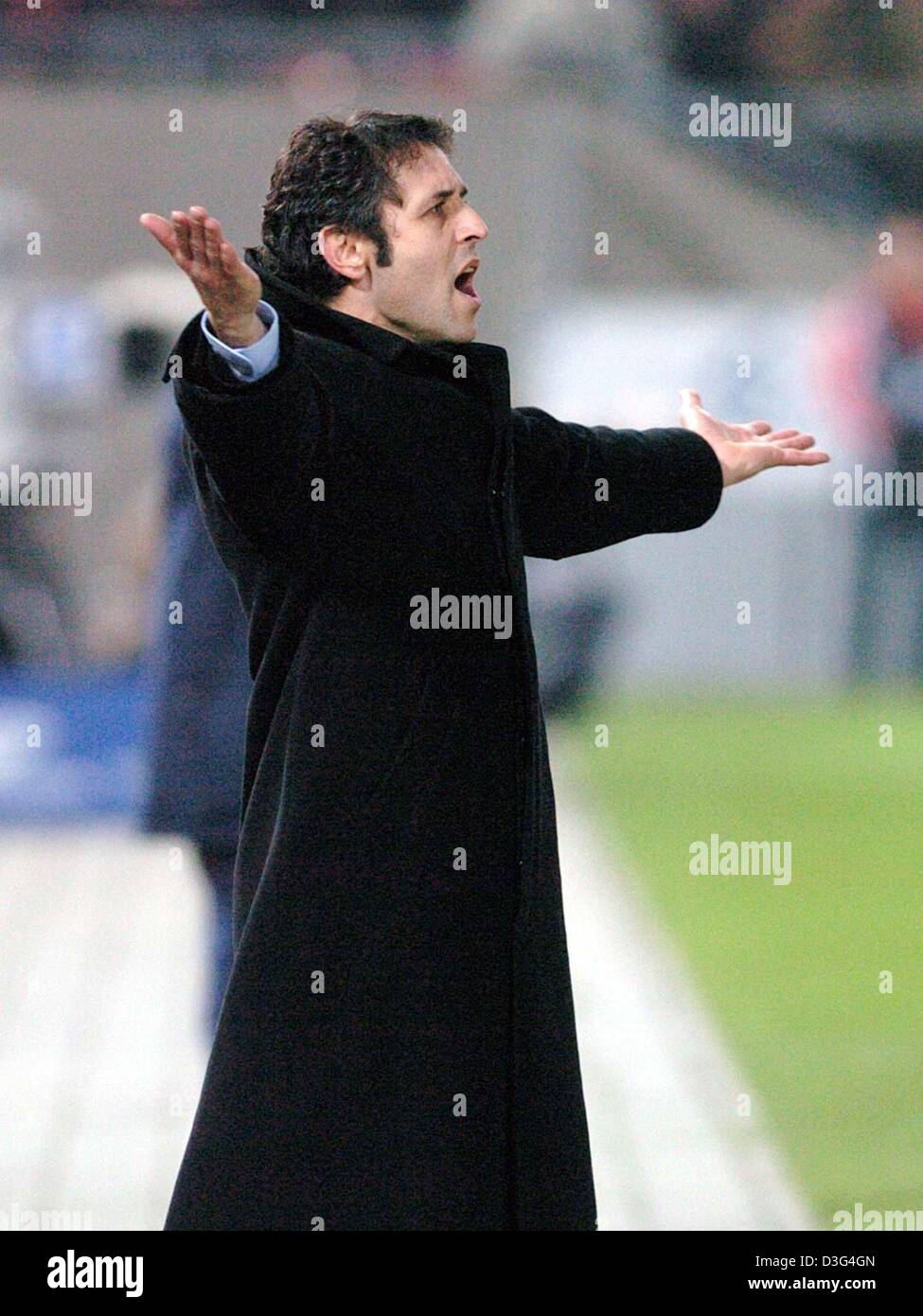 (dpa) - Cologne's Swiss soccer coach Marcel Koller shouts angrily ...