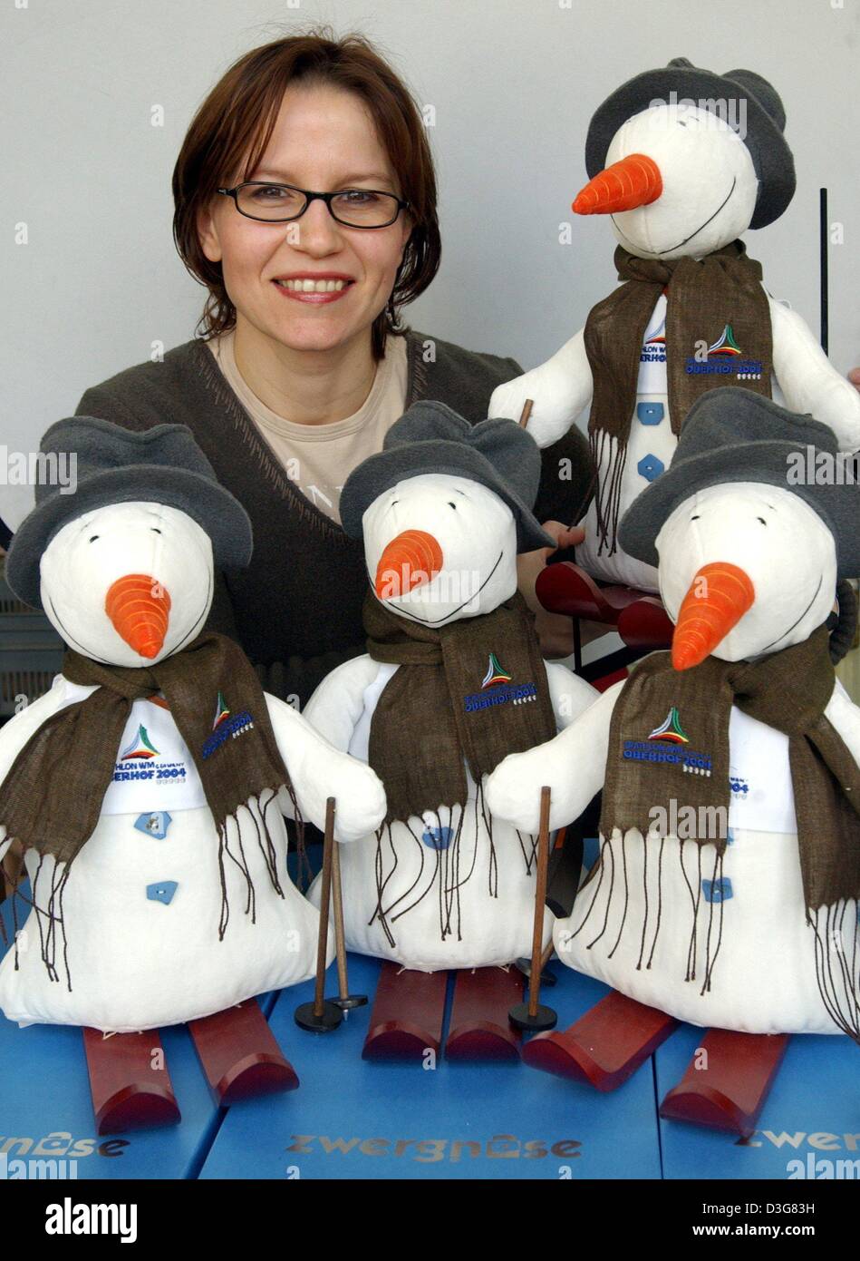 (dpa) - Designer Nicole Marschollek-Menzner shows the mascots for the ...
