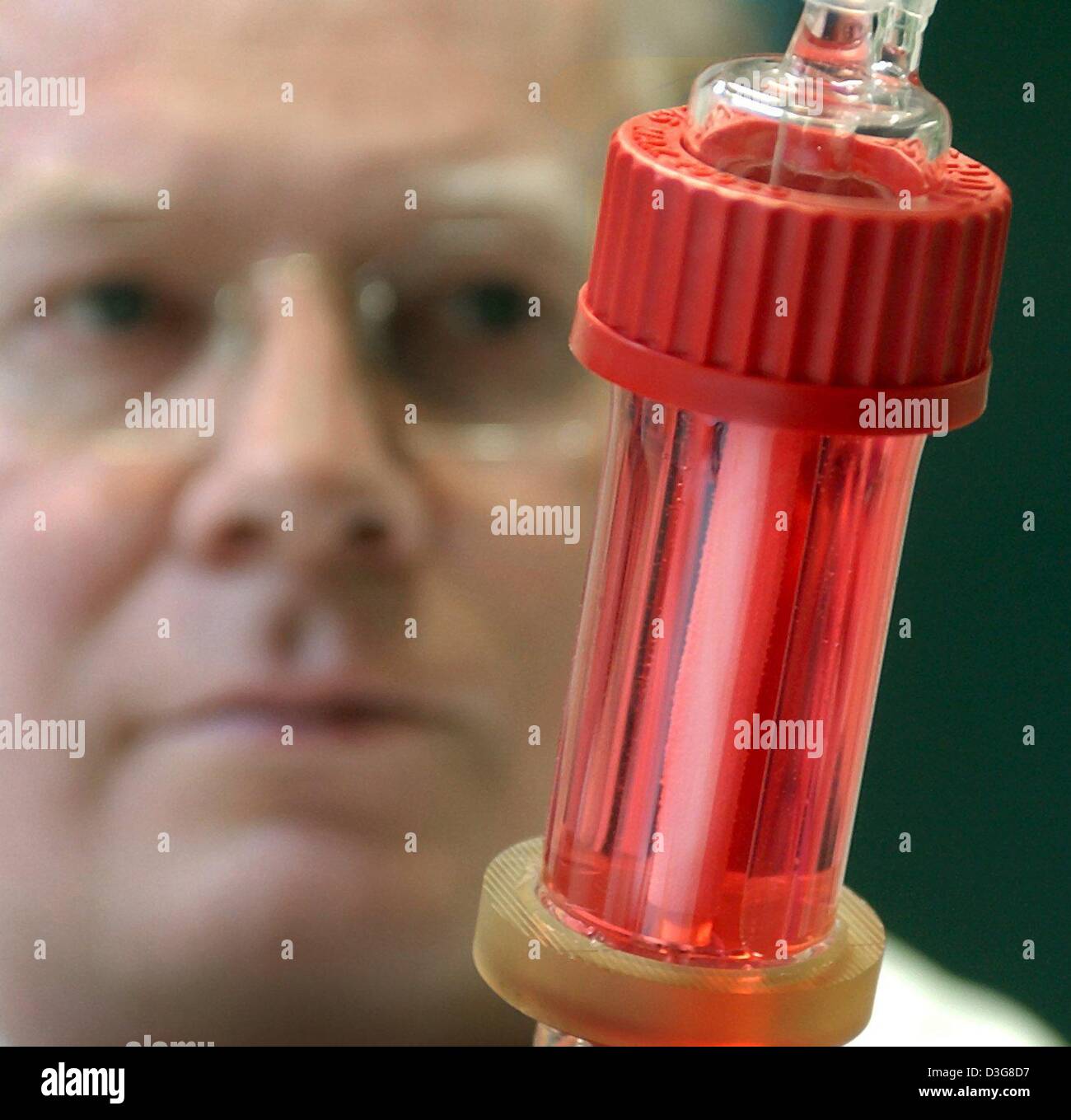 (dpa) - Professor Augustinus Bader from the University in Leipzig shows ...