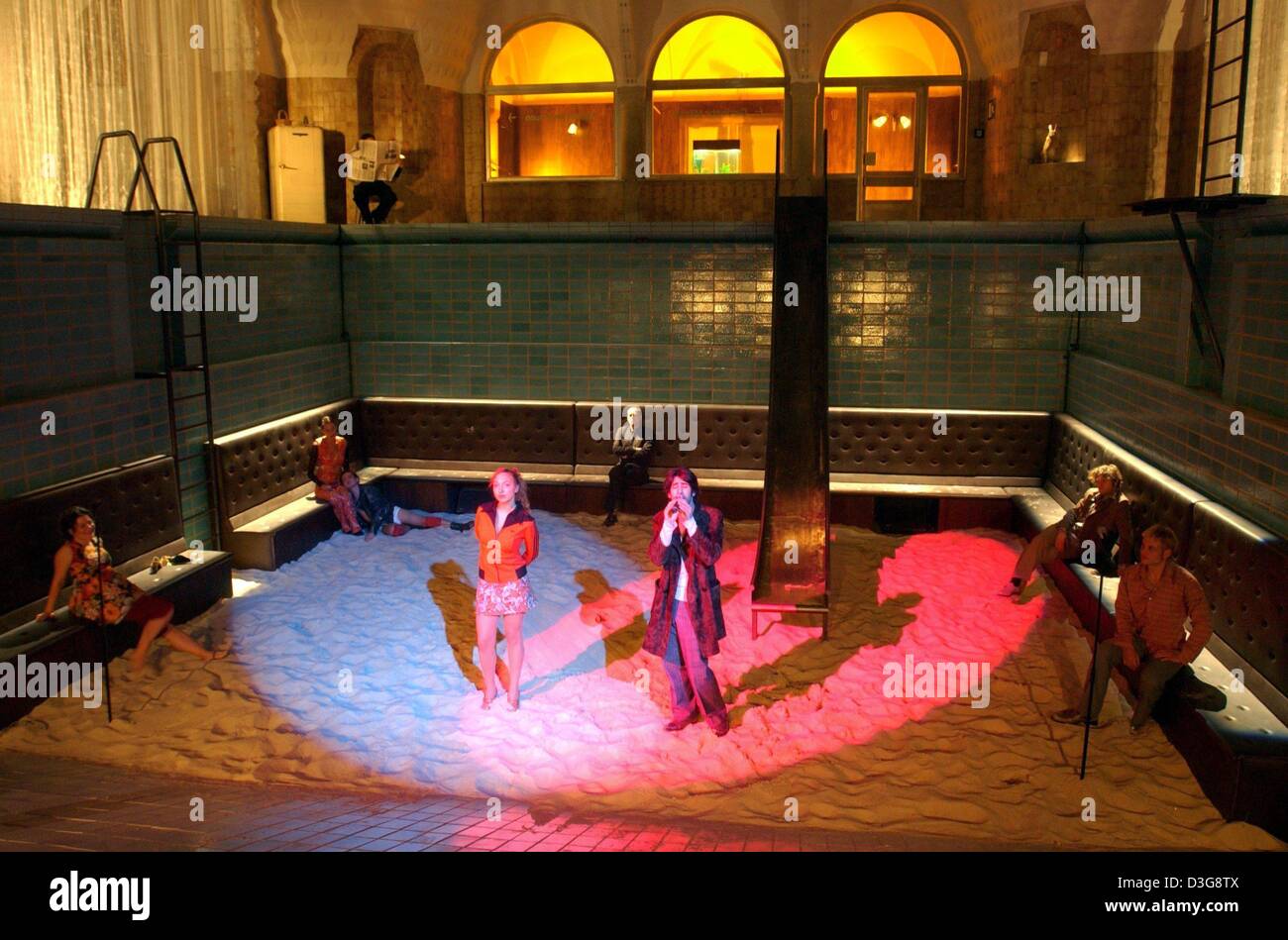 (dpa) - Actors perform in the waterless swimming pool during the piece ...
