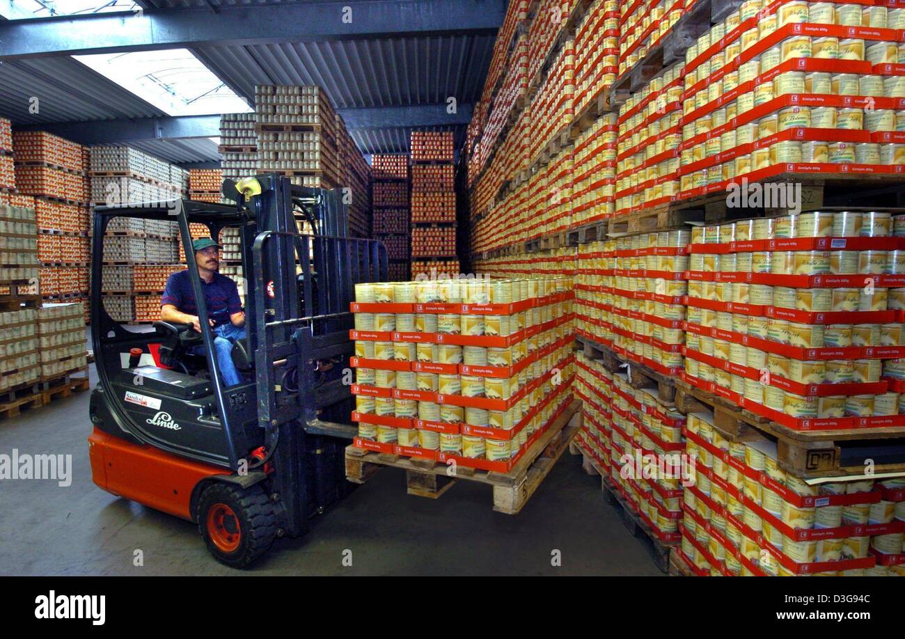 (dpa) - Michael Kretzschmar piles up pallets of mushroom preserves with ...