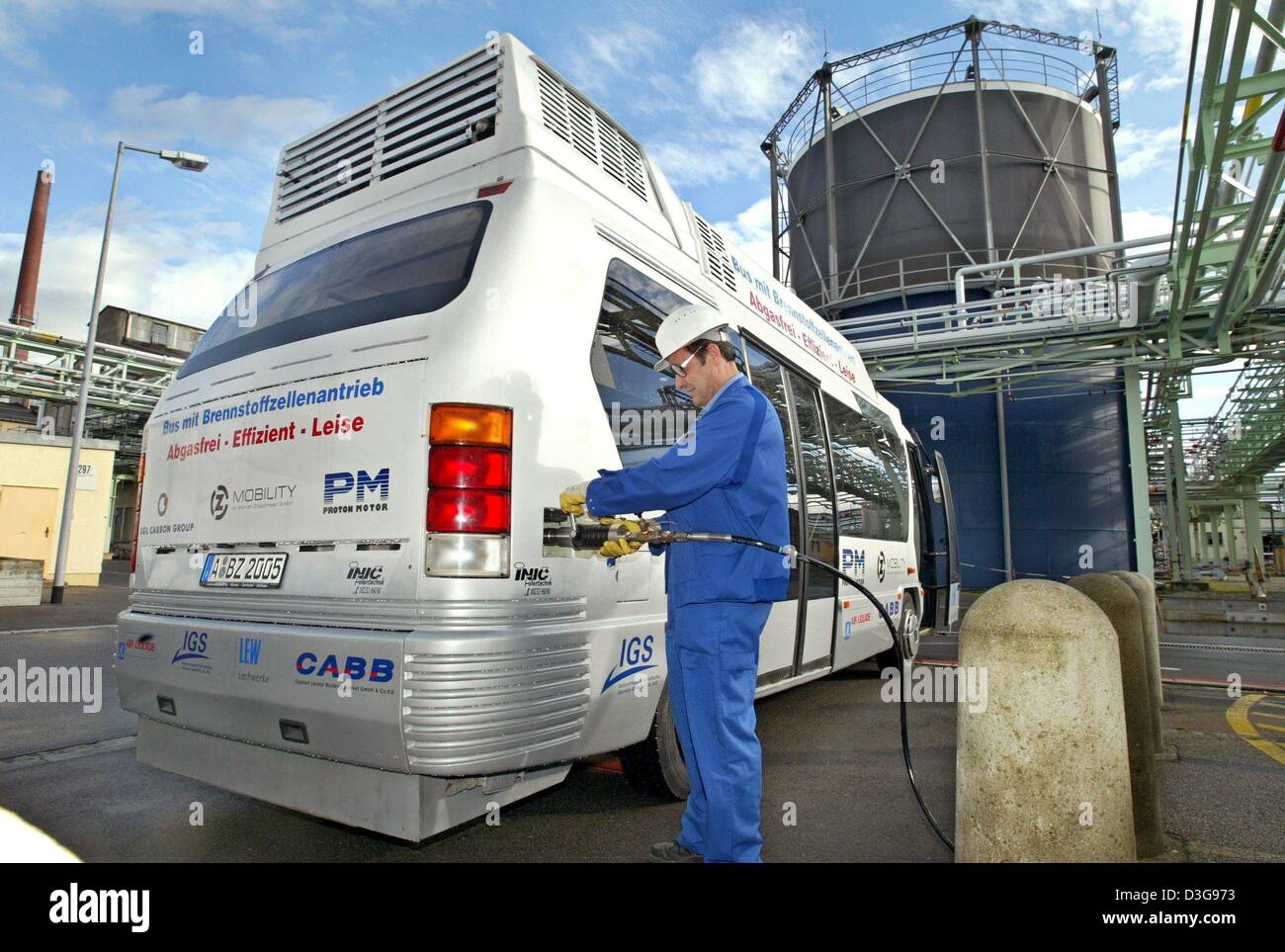 (dpa) - An employee of the Clariant chemical company fuels up a small ...