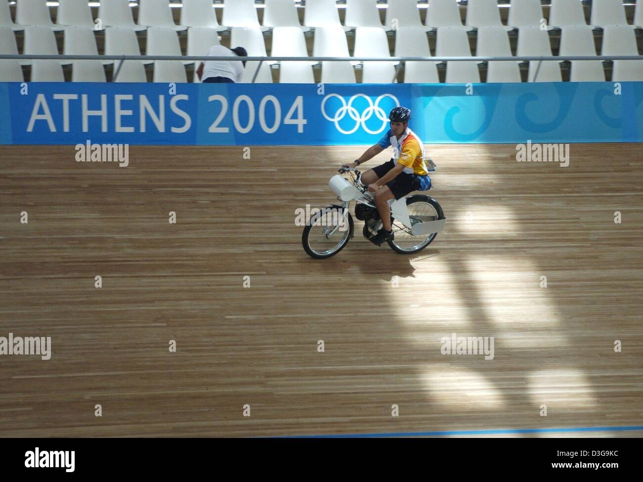 (dpa) - A derny bike, used for Keirin races, circles the Olympic ...