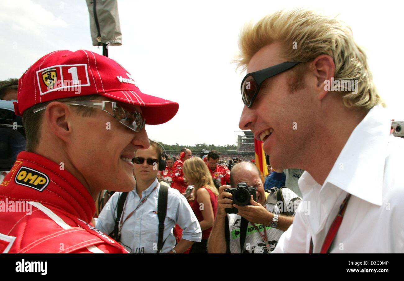 (dpa) - German Formula 1 driver Michael Schumacher (L, team Ferrari ...