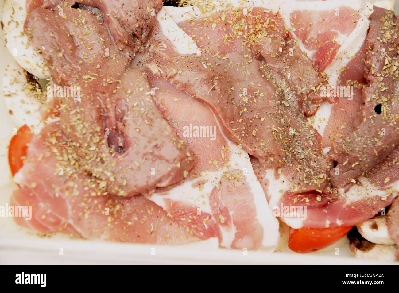 Liver & bacon casserole with vegetables seasoning & herbs ready for ...