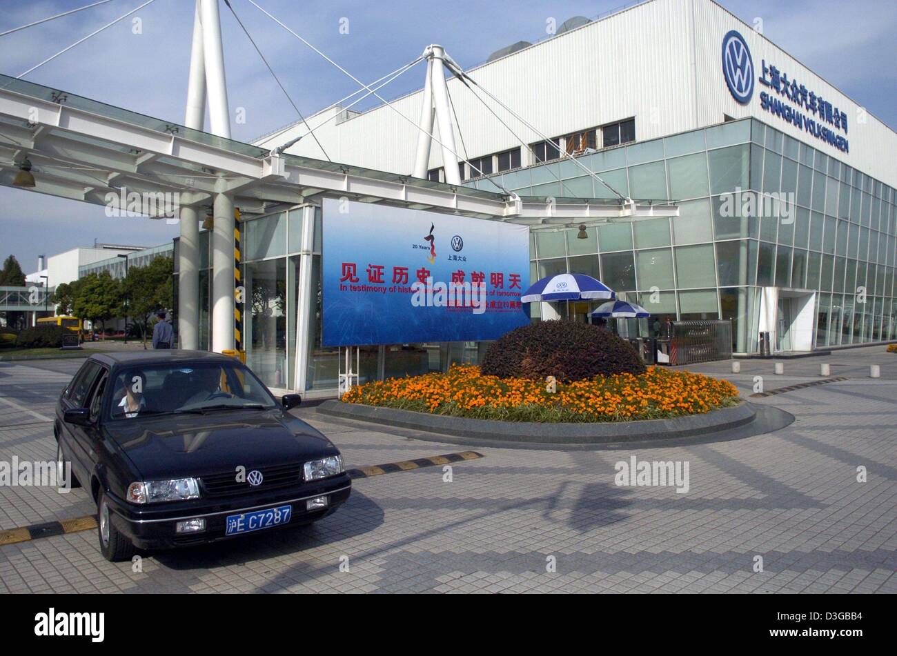 (dpa) - A VW car leaves the factory site of Chinese Joint-Venture ...