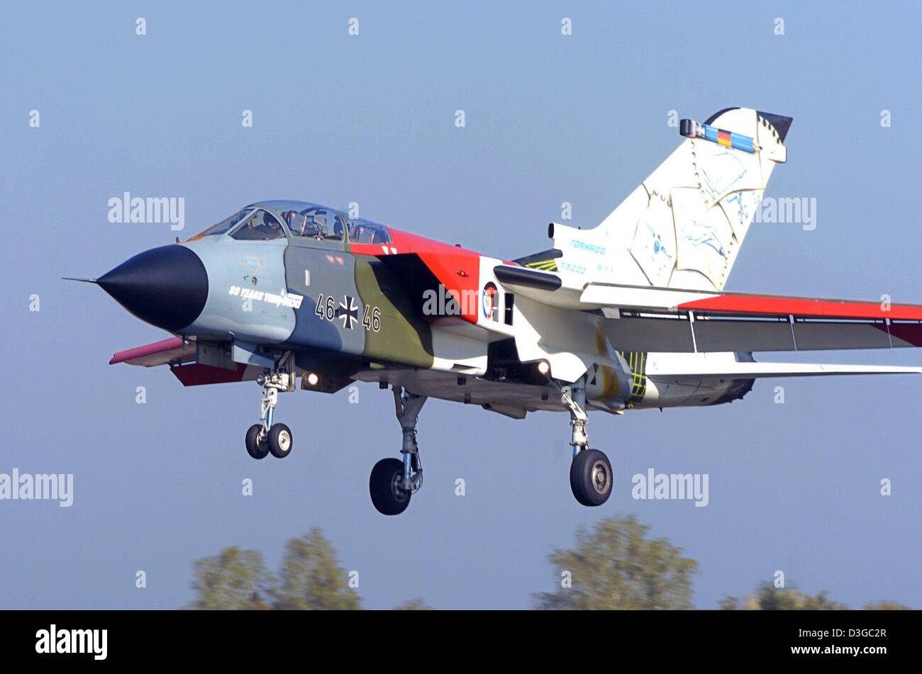 (dpa) - A colouful painted Tornado fighter jet of the German army gets ...