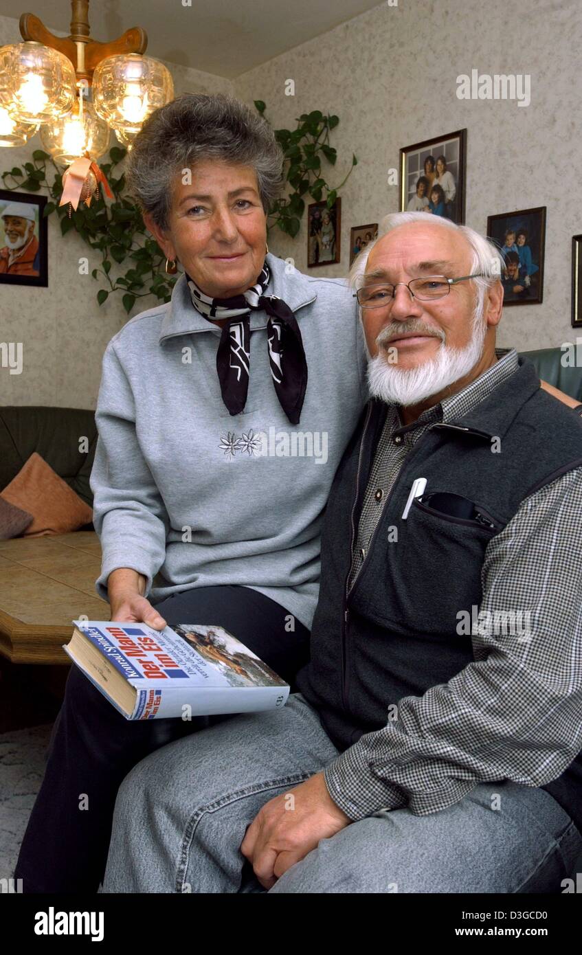 (dpa files) - Helmut Simon and his wife Erika smile holding the book ...