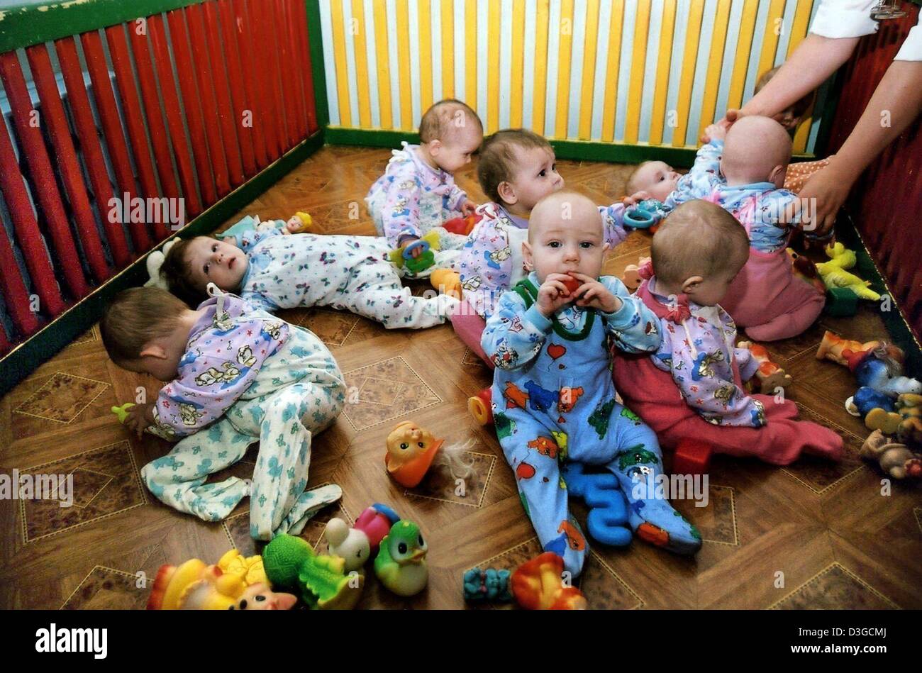 (dpa) - Infants sit in a play pen in the orphanage no. 3 in Odessa ...