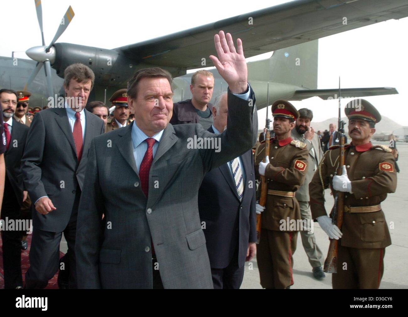 (dpa) - German Chancellor Gerhard Schroeder waves towards German ...