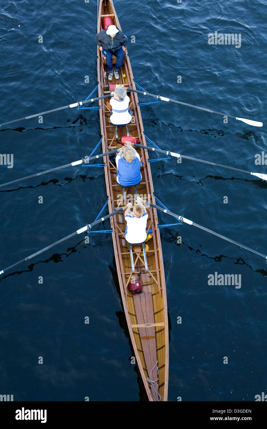 Rowing boat people sport woman exercise water blue hi-res stock ...