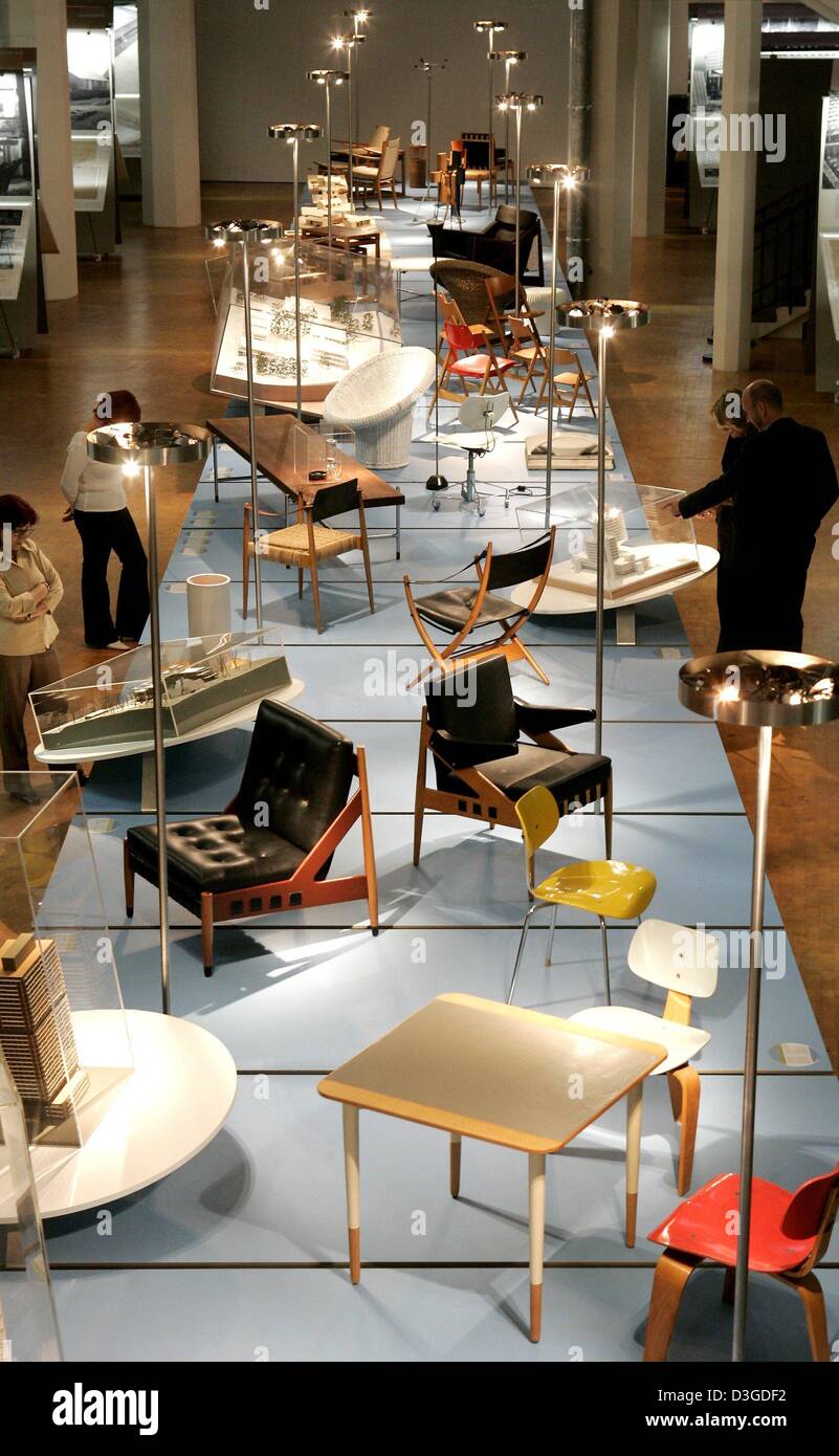 (dpa) - Visitors look at the manifold designs by famous German ...