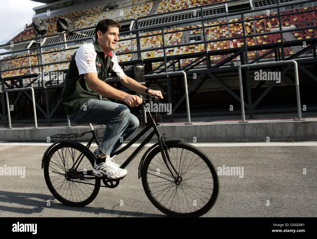(dpa) - Australian formula one pilot Mark Webber (Jaguar team) takes a ...