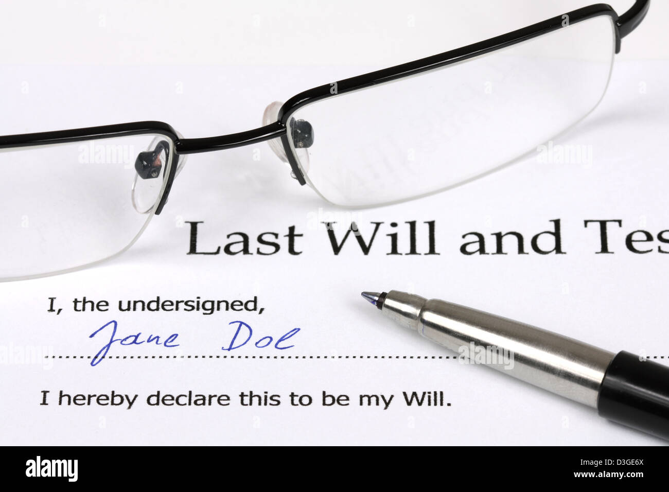 Last Will and Testament with a fictional name and signature. Glasses ...