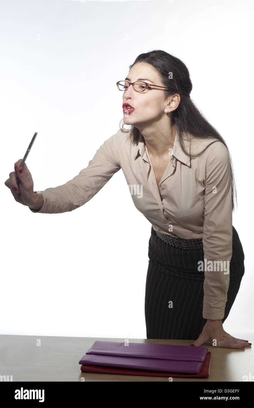 Teacher telling off pen hand Stock Photo - Alamy
