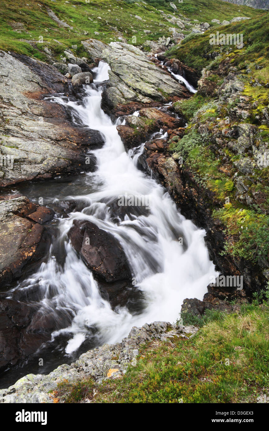 Beautiful waterfall in the rugged Norwegian mountains Stock Photo - Alamy