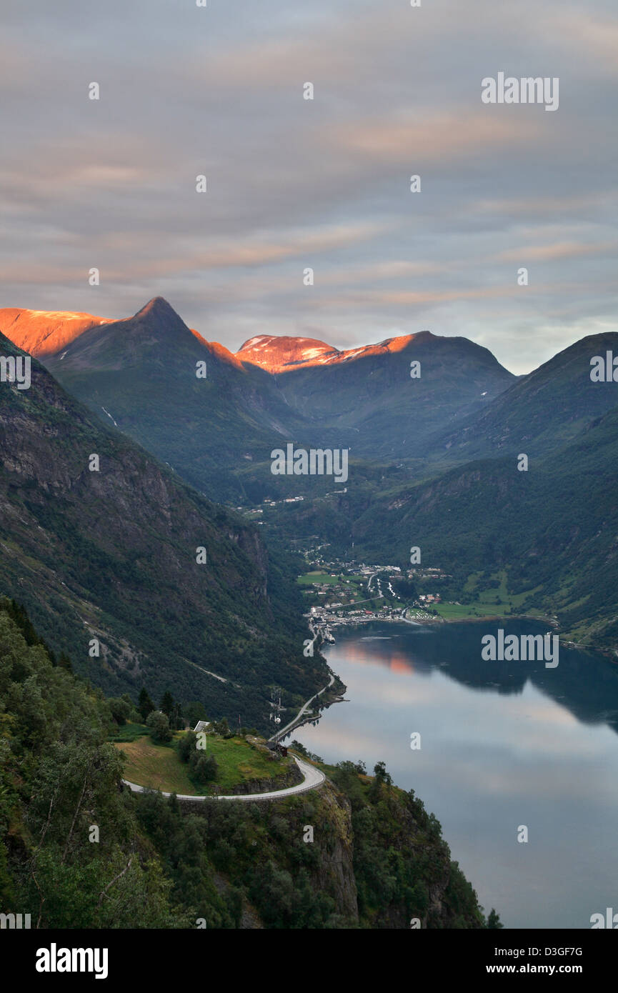 Geiranger Fjord on a beautiful sunset with the last rays of sun on the ...