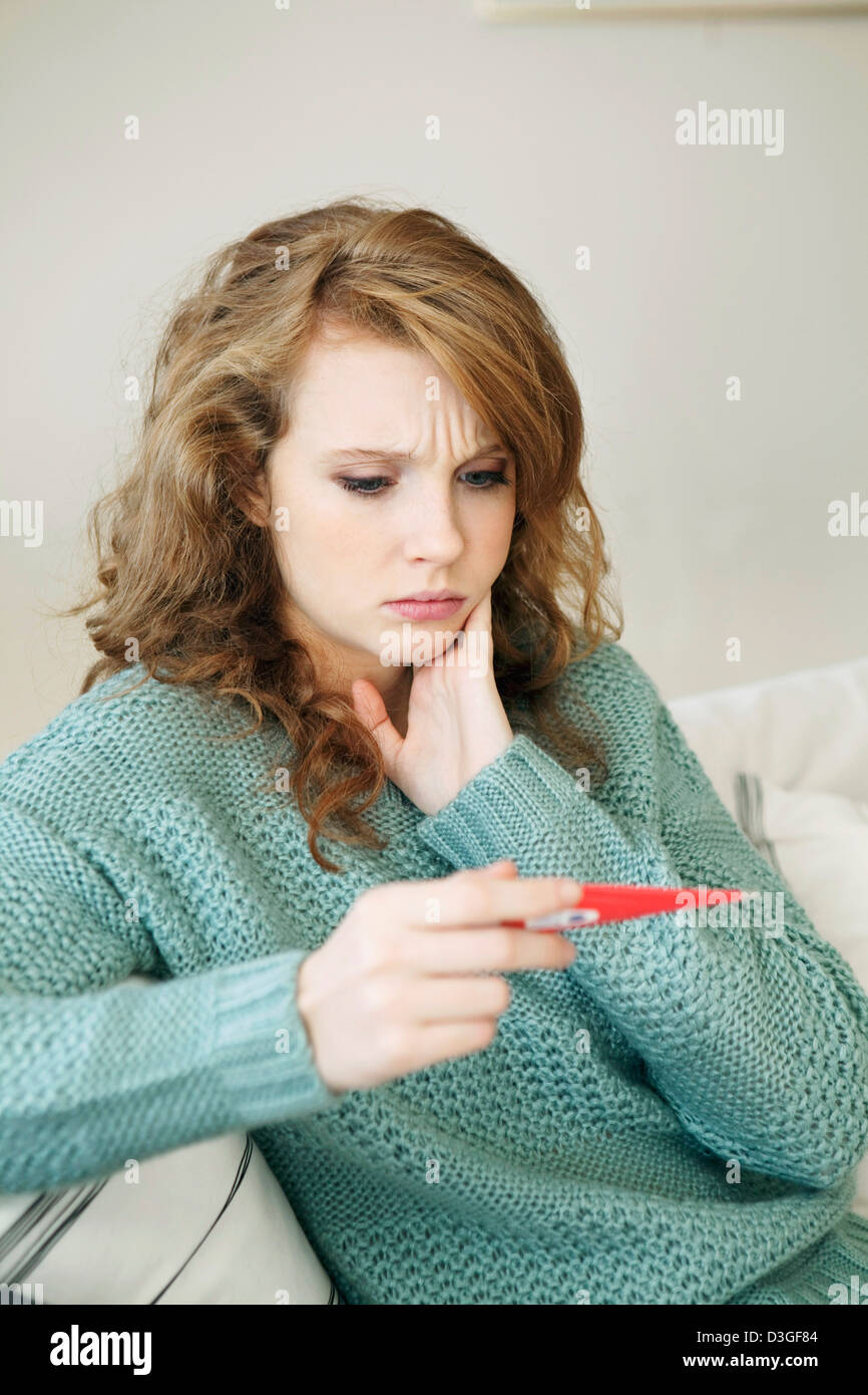 WOMAN WITH FEVER Stock Photo - Alamy