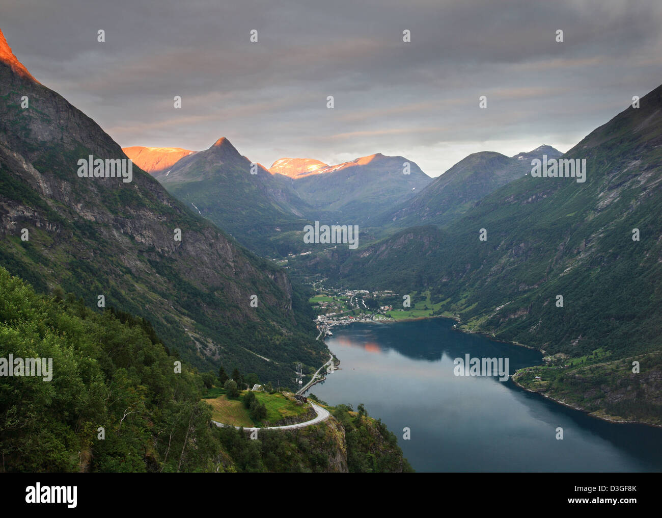 Geiranger Fjord on a superb sunset with the last rays of sun on the ...