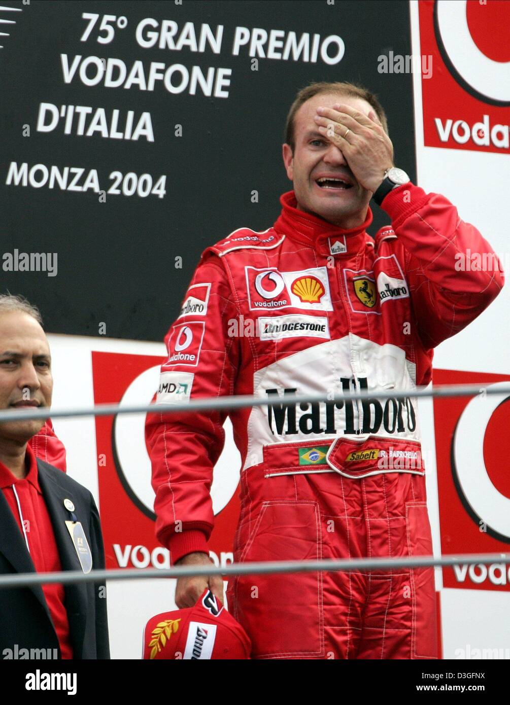 (dpa) - Ferrari Formula 1 driver Rubens Barrichello from Brazil smiles ...