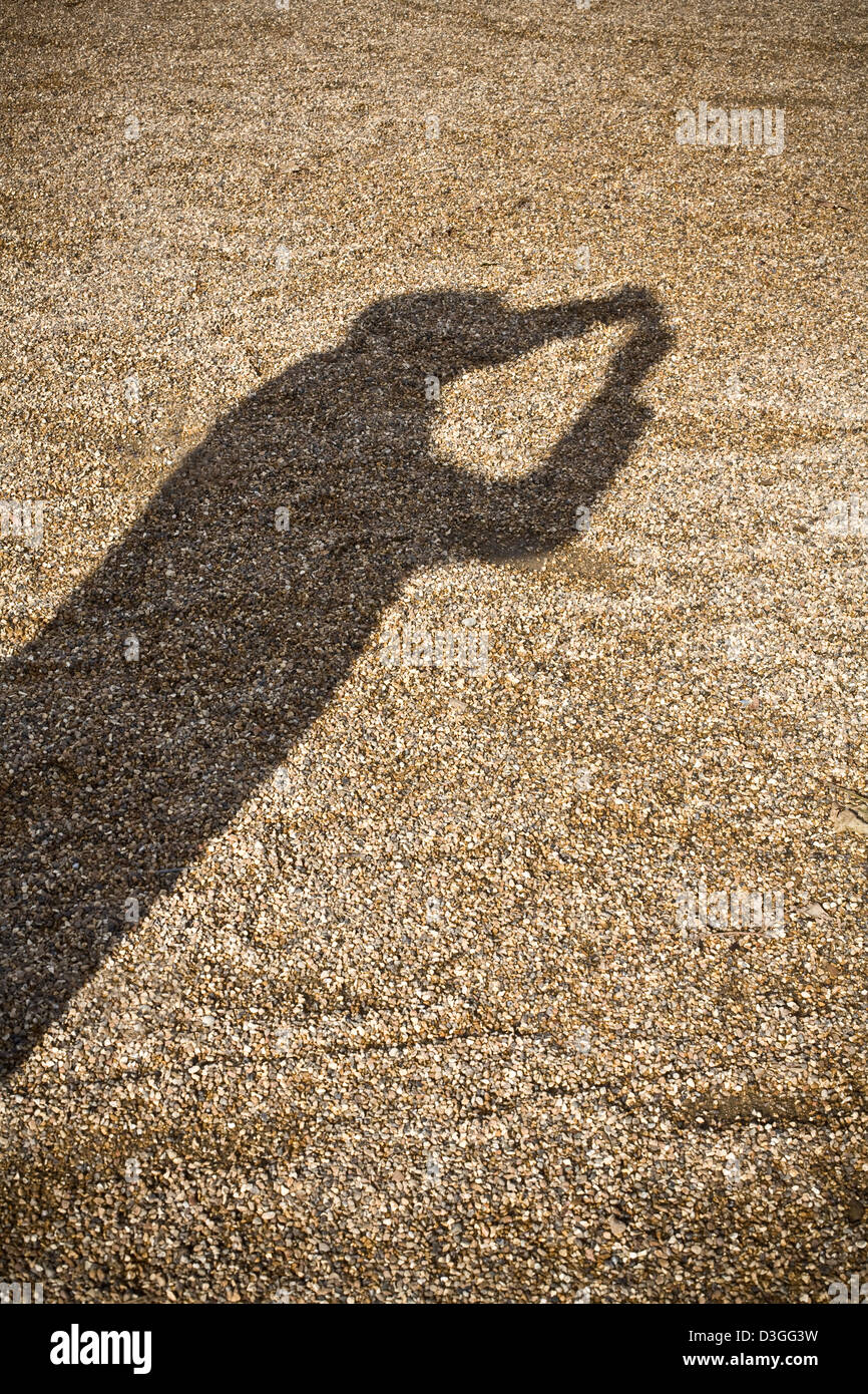 shadow of person taking a photograph Stock Photo - Alamy