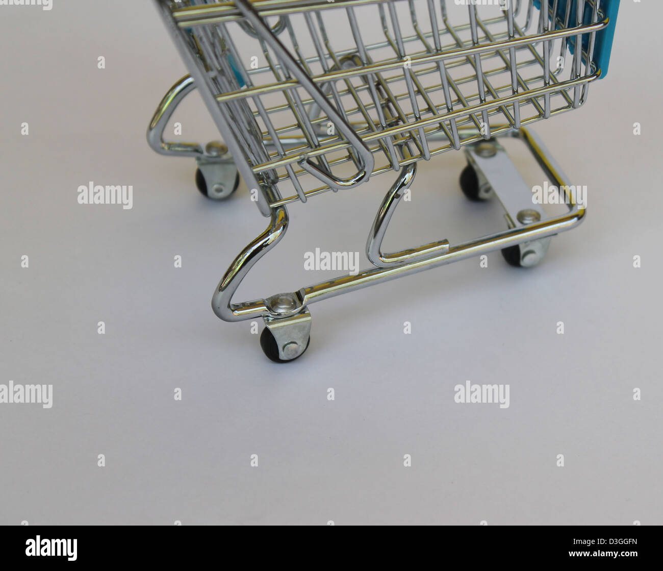 Wheels of a shopping cart Stock Photo - Alamy