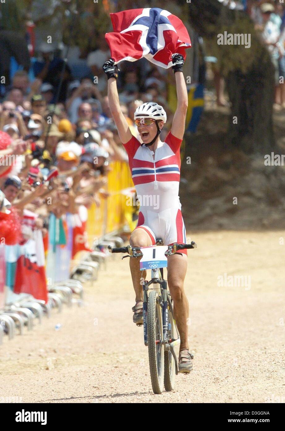 Norway's Gunn-Rita Dahle jubilates after she won the women's Cross ...