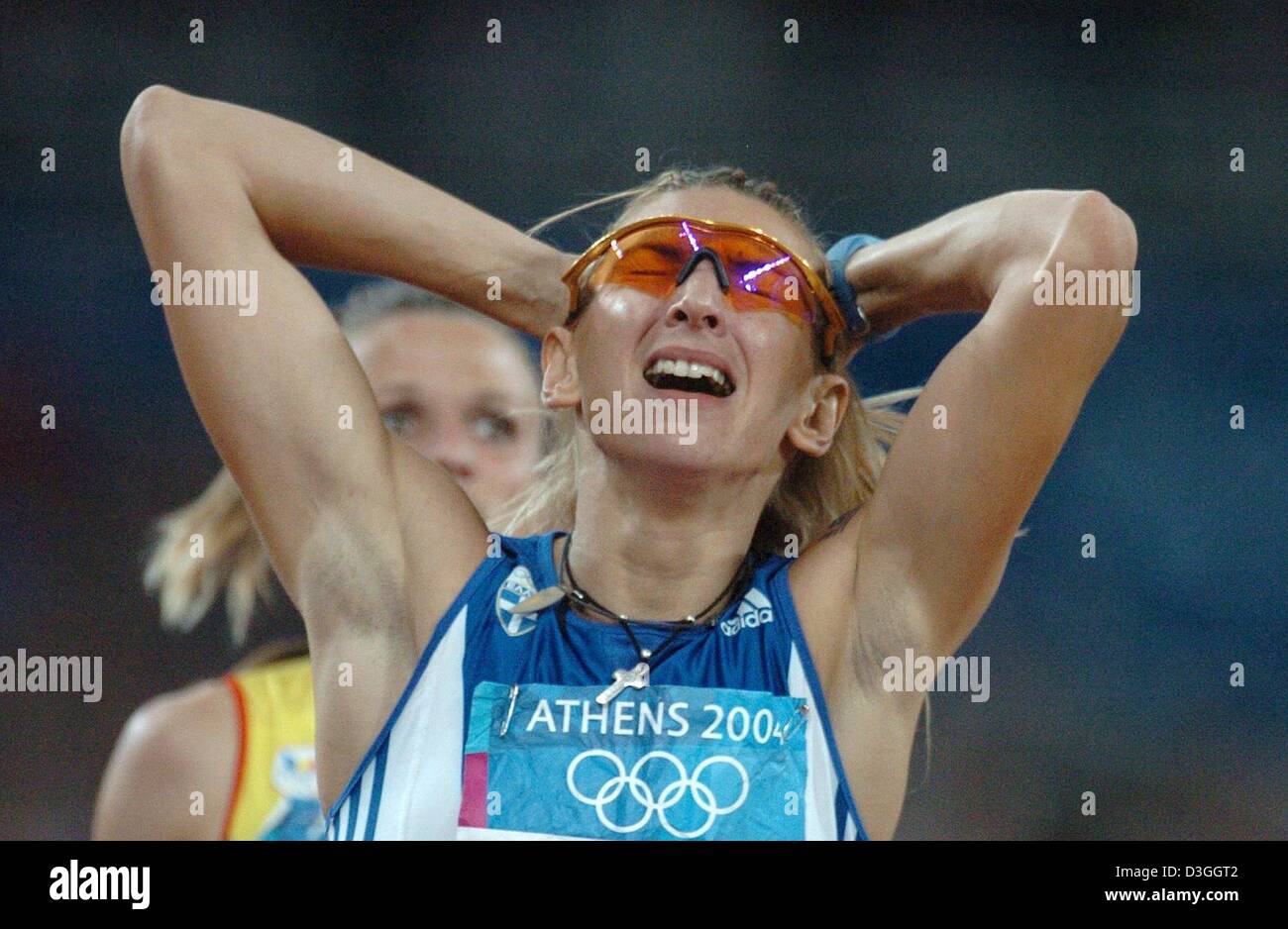 (dpa) - Greek runner Fani Halkia jubilates after winning the Women's ...