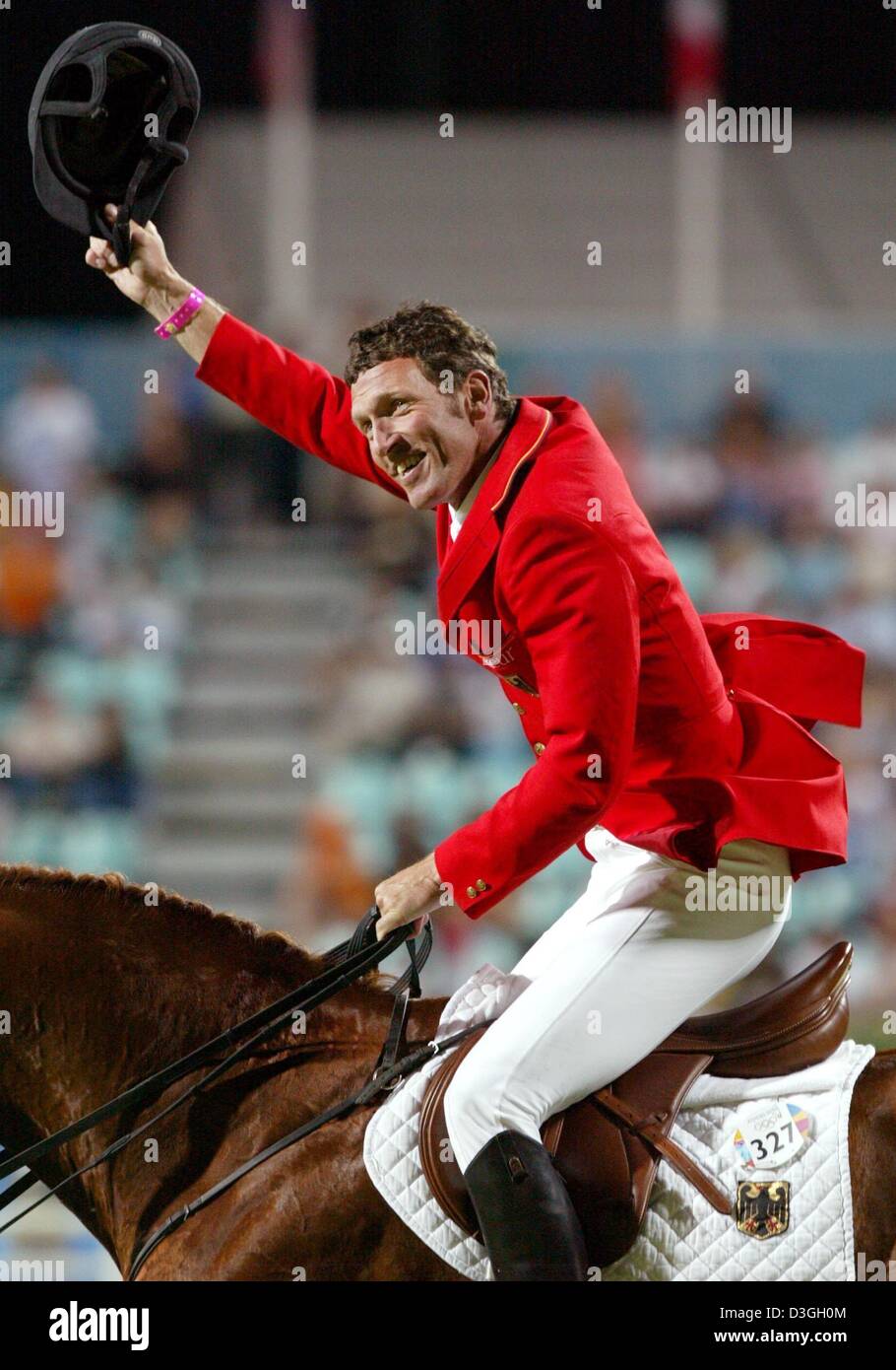 (dpa) - German rider Ludger Beerbaum on 'Goldfever' jubilates after ...