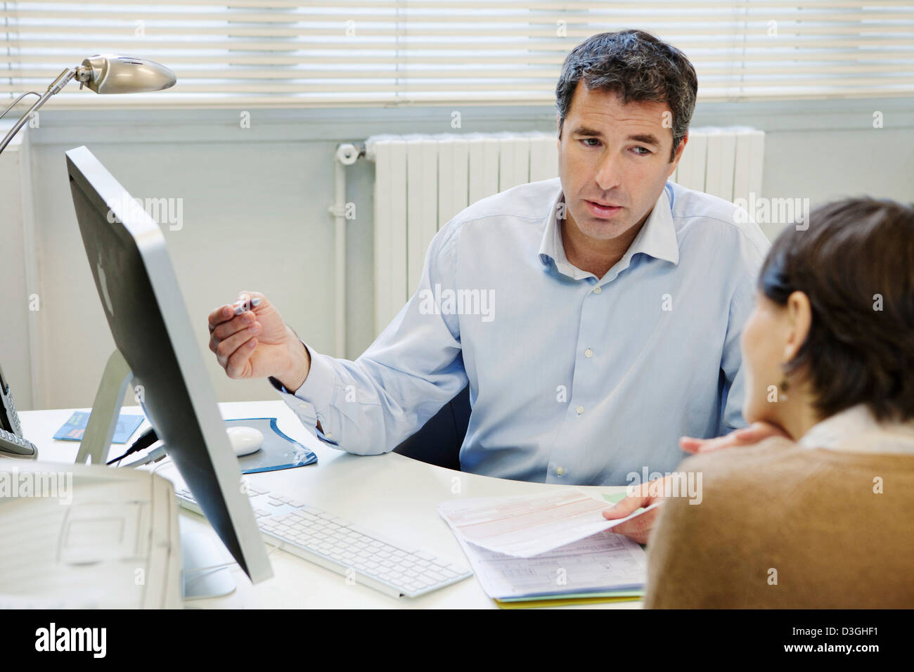 WOMAN IN CONSULTATION, DIALOGUE Stock Photo - Alamy