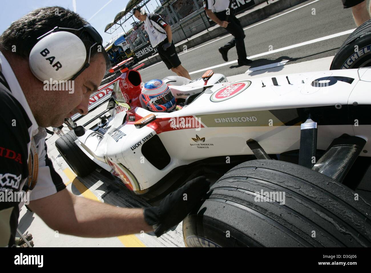 (dpa) - British formula one pilot Jenson Button stops his BAR Honda ...