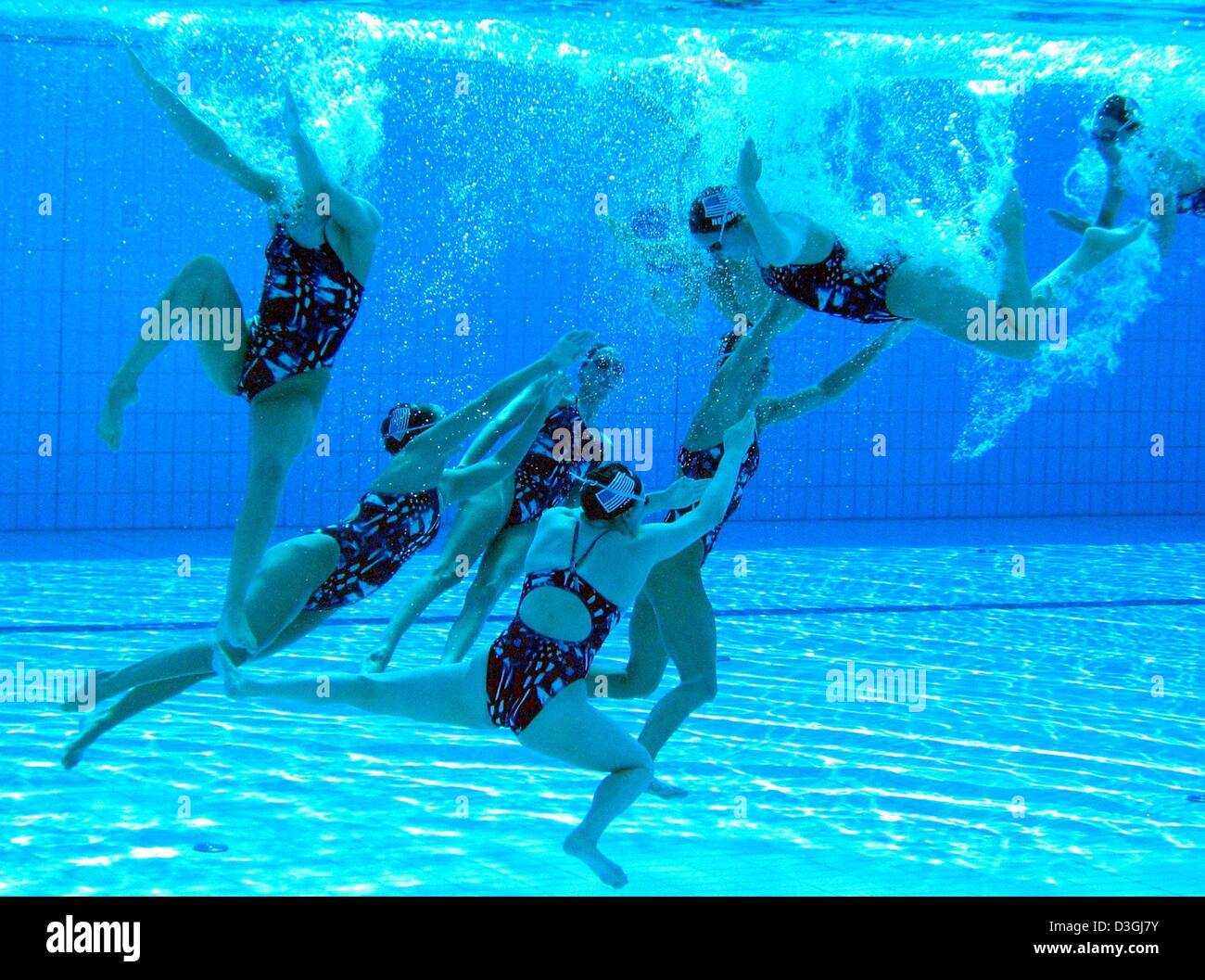 (dpa) - Members of the US Synchronized Swim Team perform during a ...