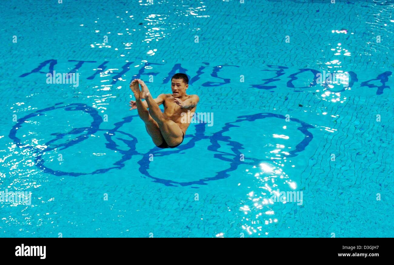 Olympic Diving Into A Pool