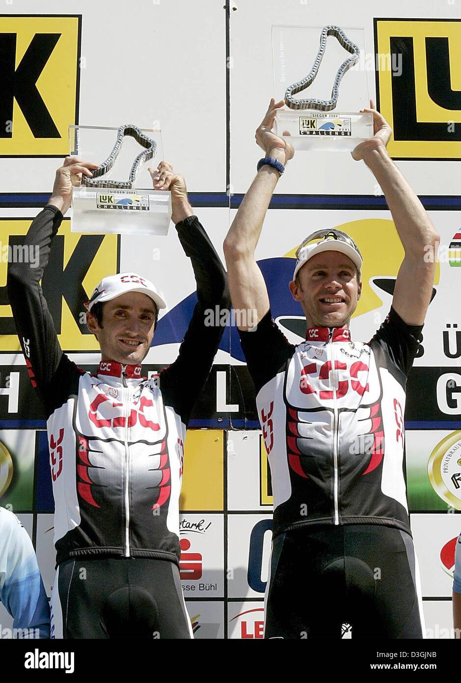 Sports spo cycling smiling cheering trophy germany hi-res stock ...