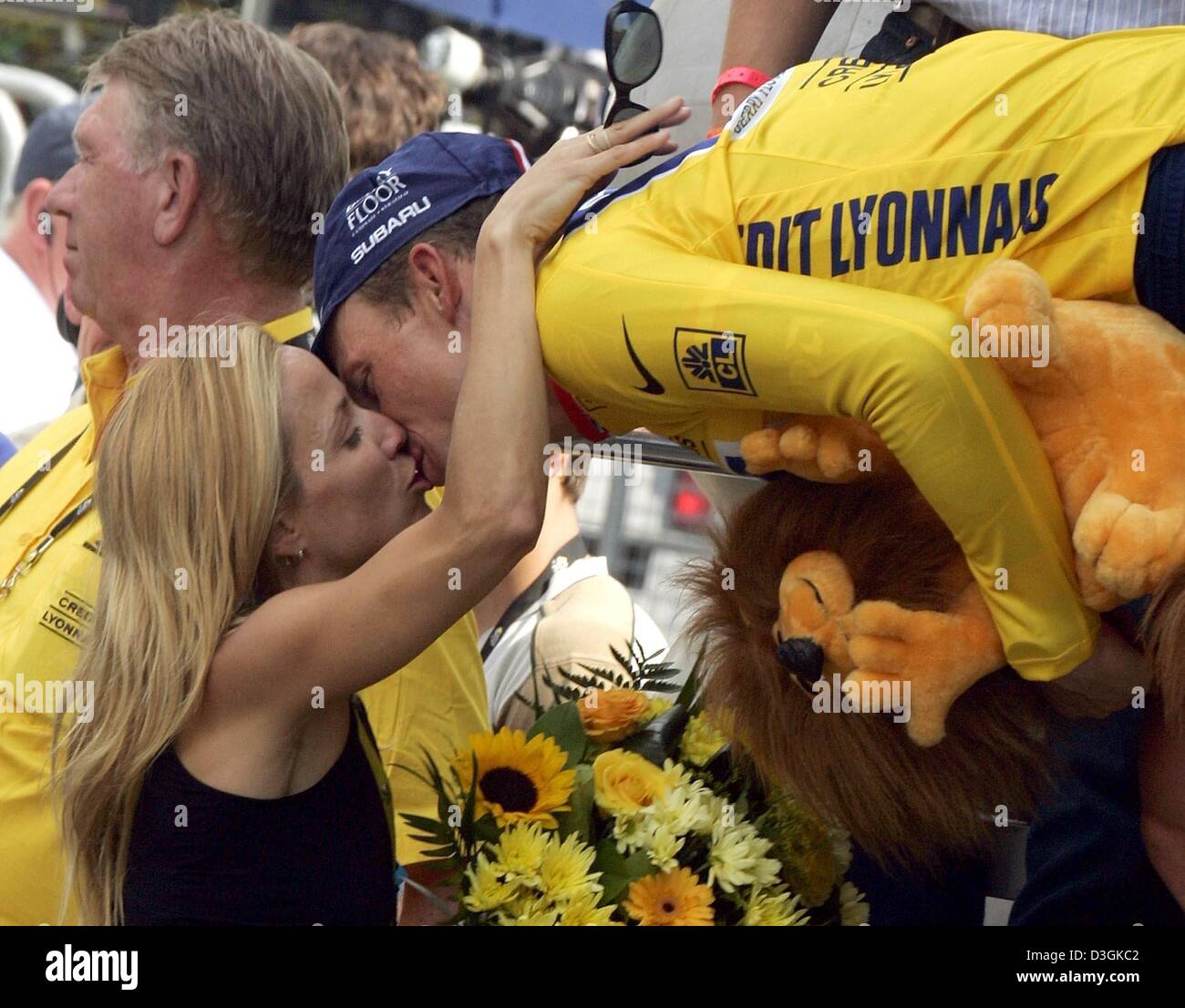 (dpa) - Five time Tour winner Lance Armstrong of team US Postal gets a ...