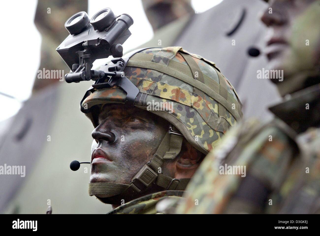 (dpa) - An infantryman of the Bundeswehr (German army), equiped with a ...