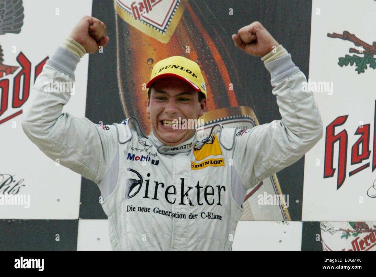 (dpa) - British DTM Mercedes pilot Gary Paffett cheers during the award ...