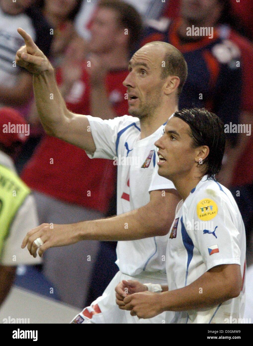 (dpa) - Czech defender Jan Koller (back) jubilates after scoring the 1 ...